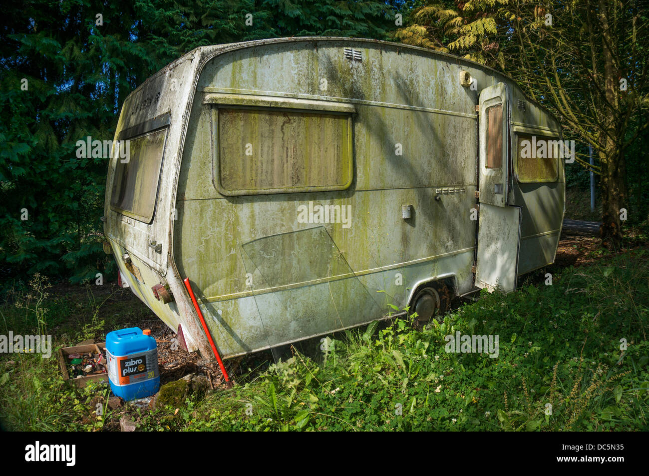 A disused, old, rundown caravan in Clécy (in the Calvados department ...