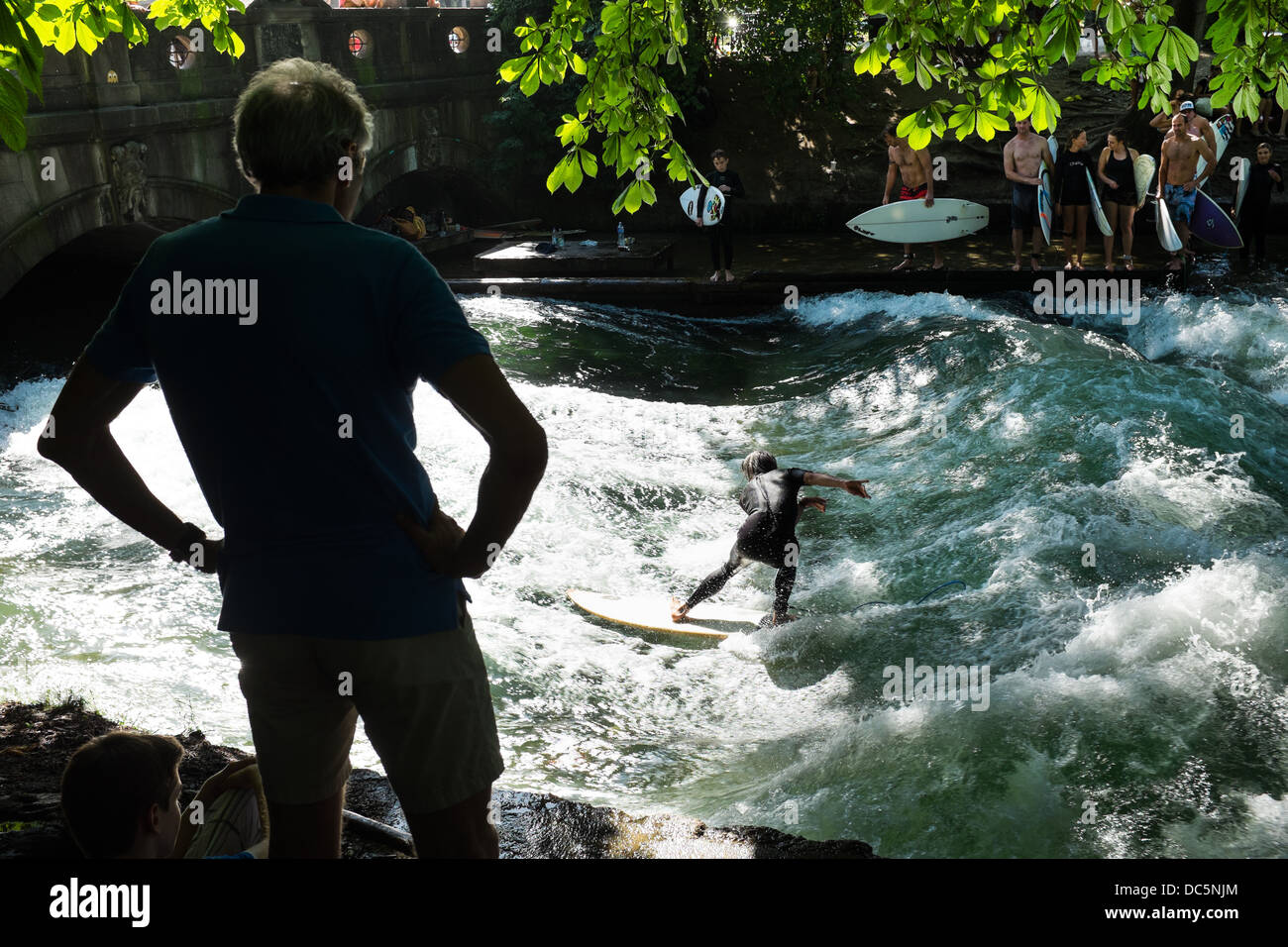 Eisbach river surfers in Munich, Germany Stock Photo - Alamy