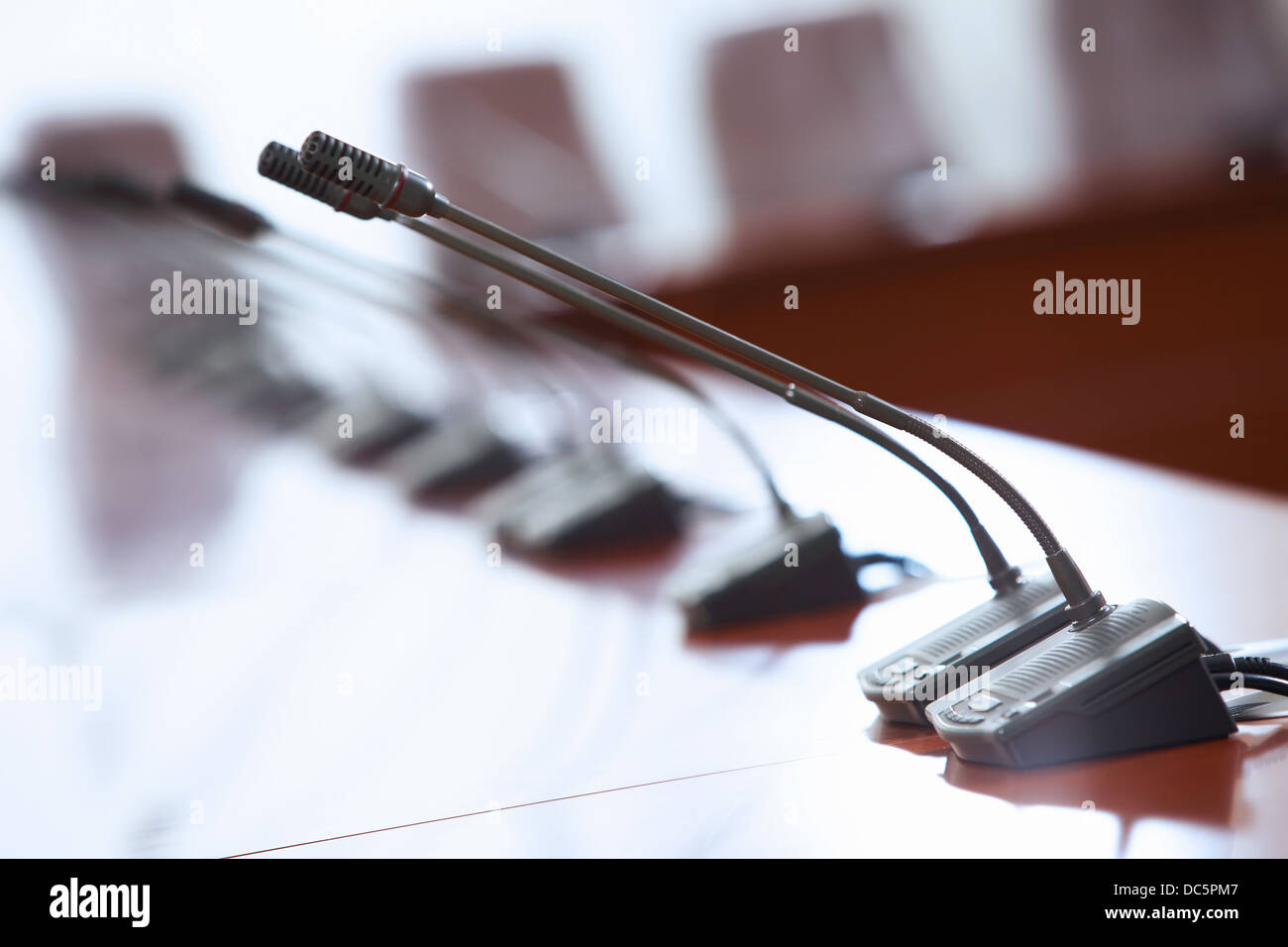 Conference hall with microphones Stock Photo - Alamy