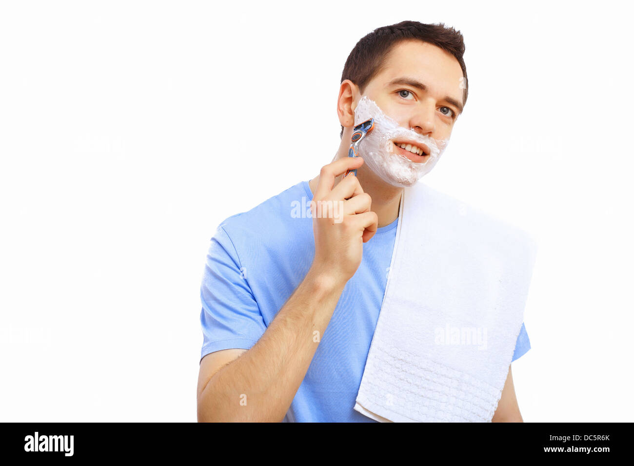 Young man shaving himself close hi-res stock photography and images - Alamy