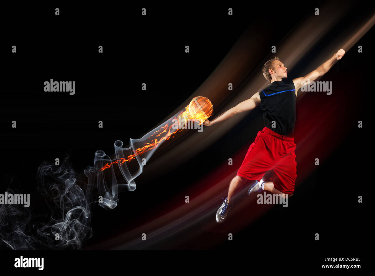 Basketball player with a ball Stock Photo - Alamy