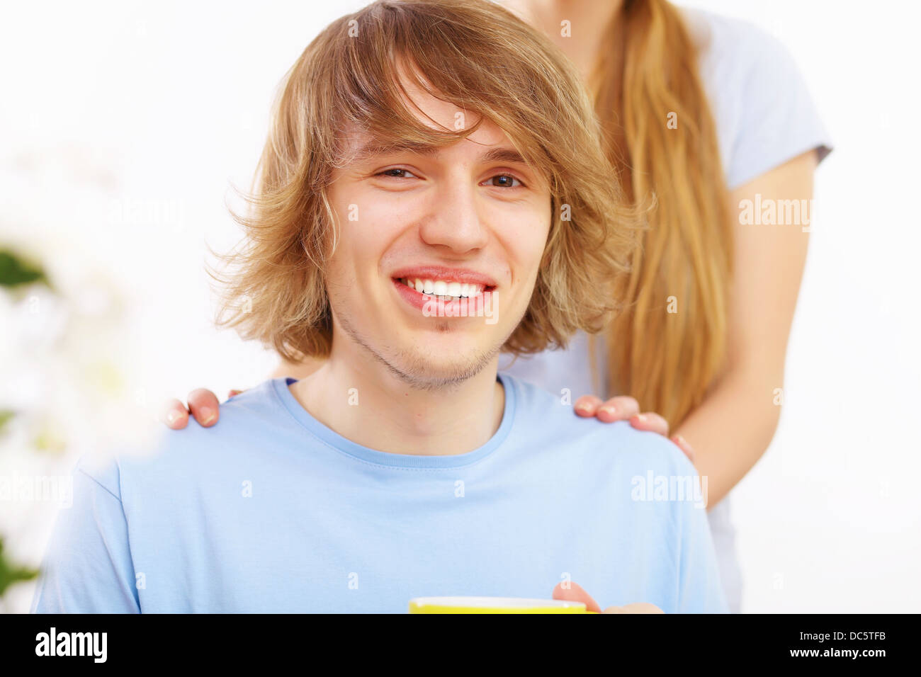 Young happy man drinking tea Stock Photo - Alamy Young happy man drinking tea Stock Photo - Alamy
