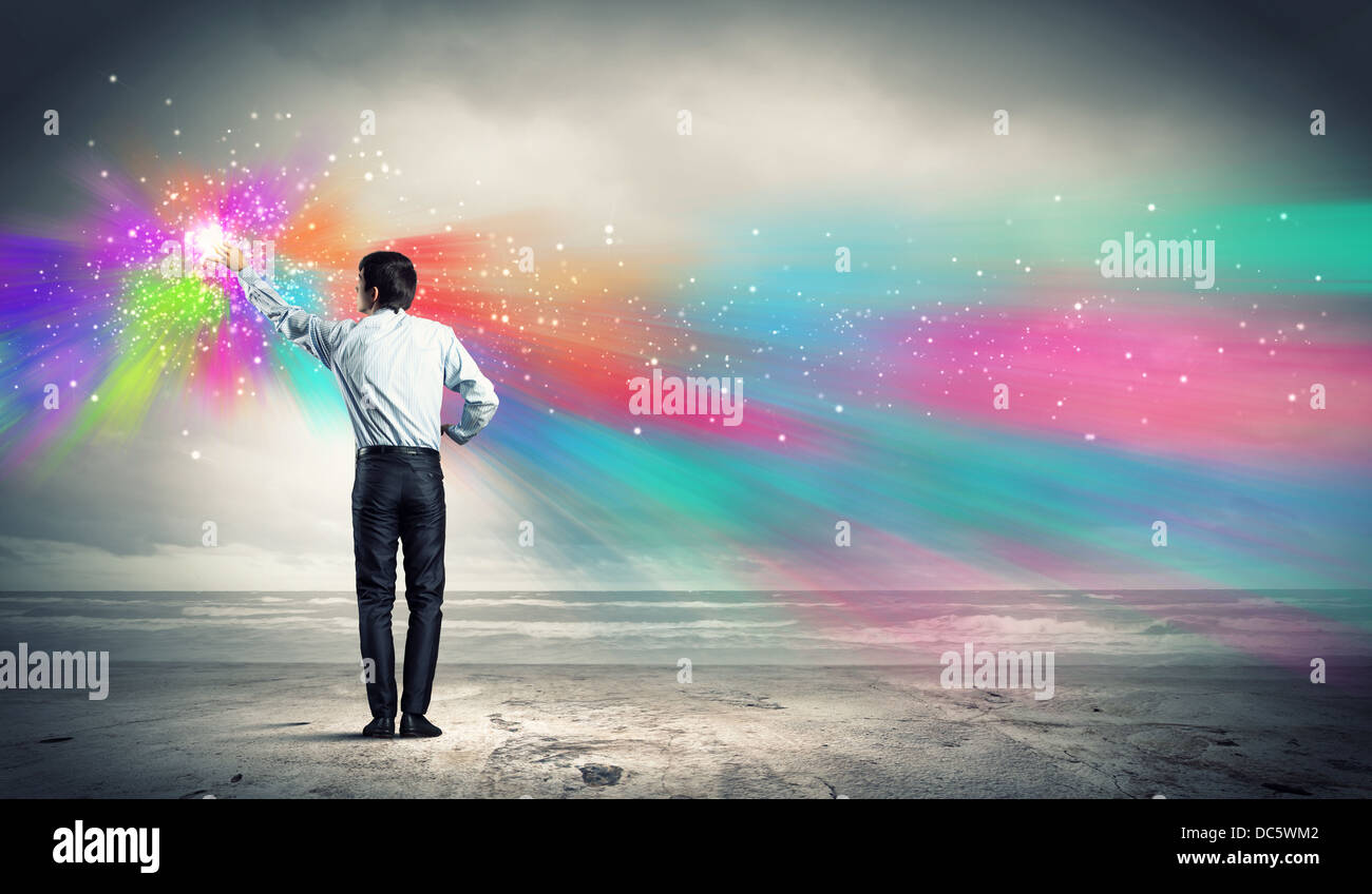 Man painting splashes Stock Photo - Alamy