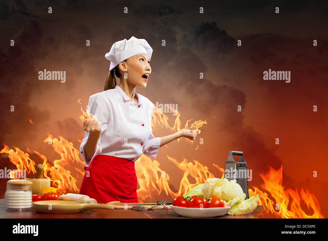 Asian female cook in anger Stock Photo - Alamy