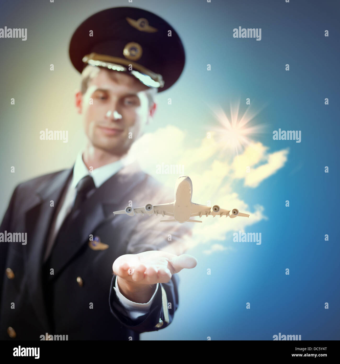 Image of pilot with plane in hand Stock Photo - Alamy