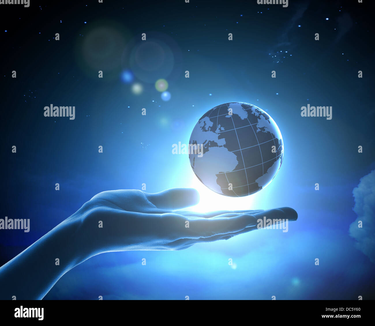 Image of earth planet on hand Stock Photo - Alamy