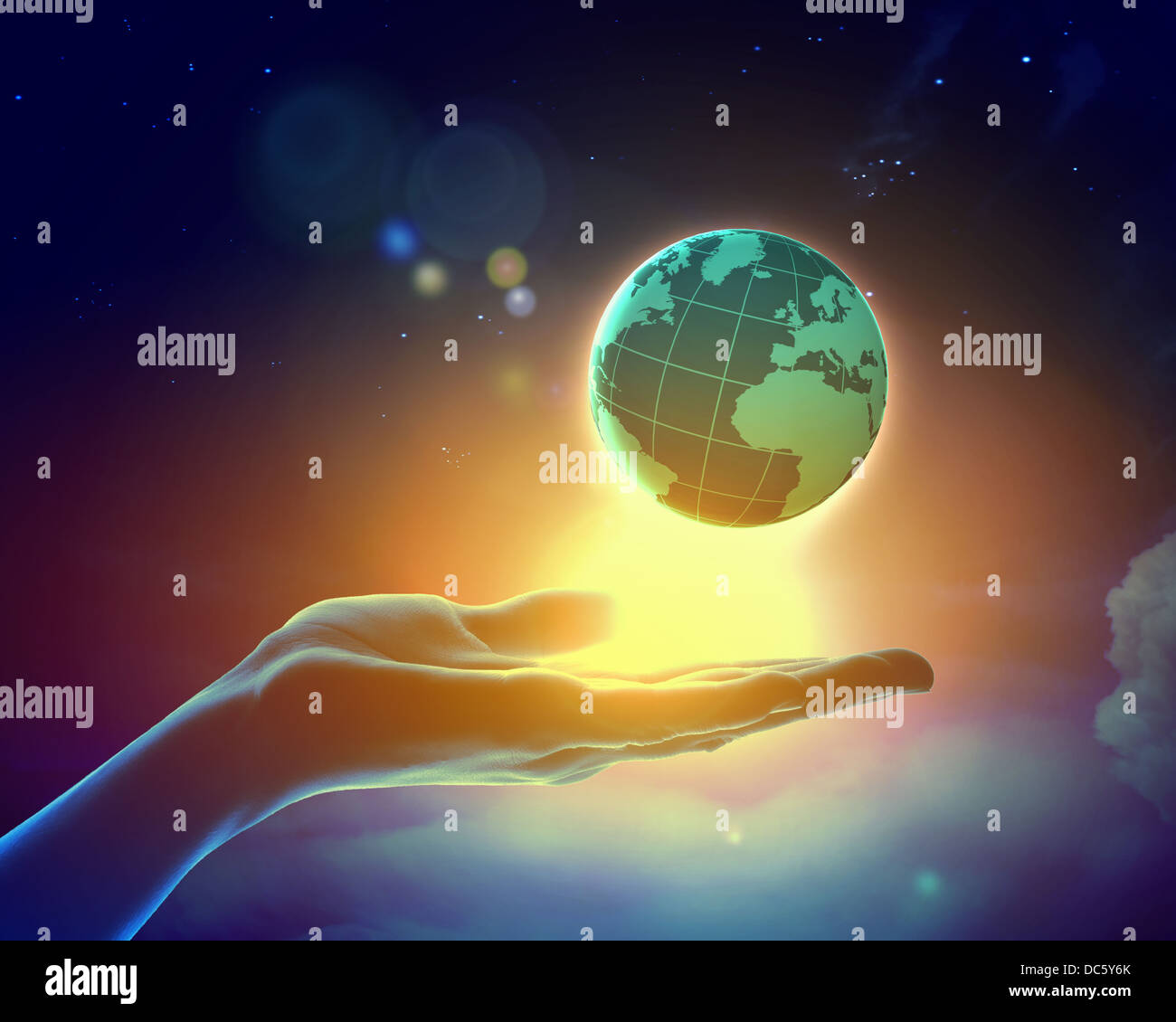 Image of earth planet on hand Stock Photo - Alamy