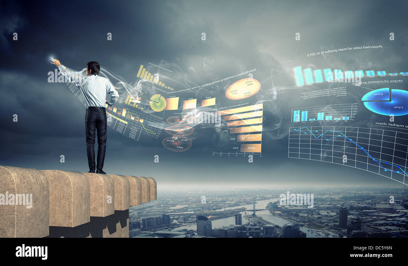 Businessman drawing diagram Stock Photo - Alamy