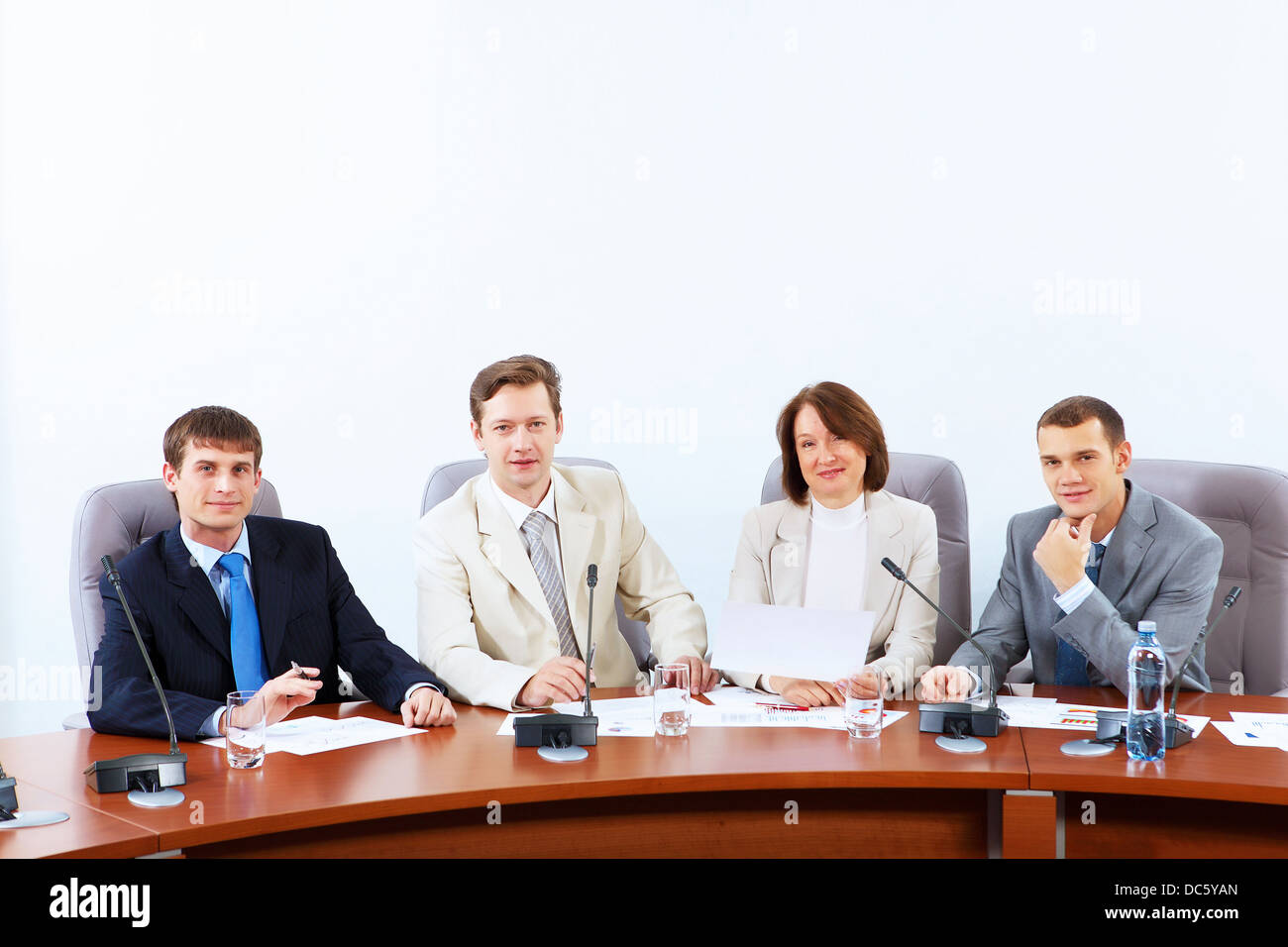 Four businesspeople at meeting Stock Photo - Alamy