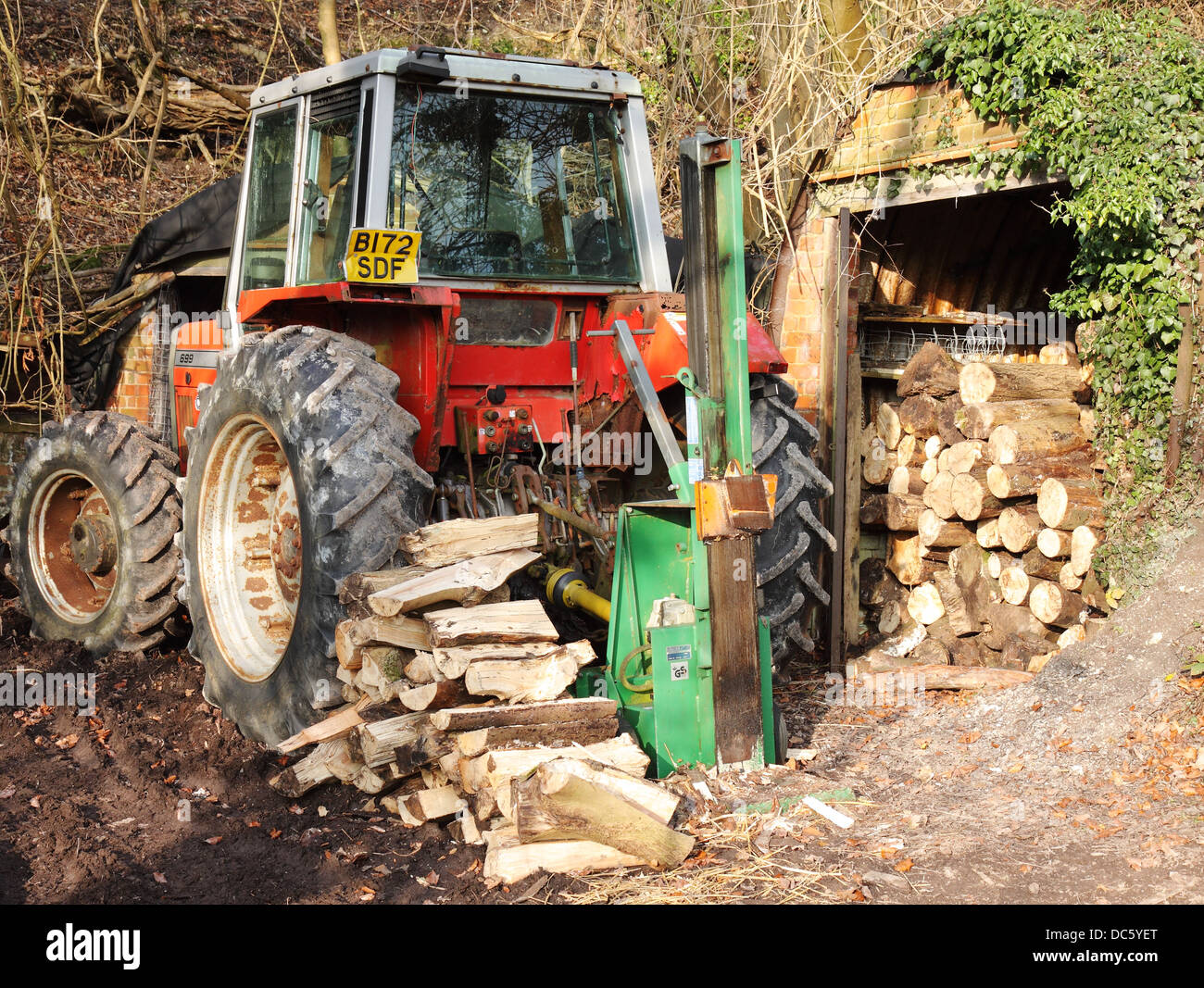 Tractor Parked in woodland with Hydraulic attachment for splitting Logs ...