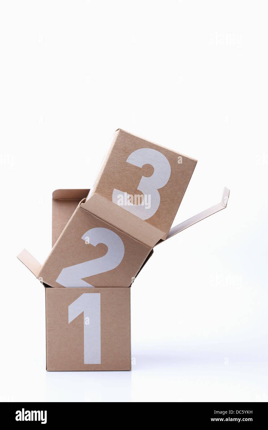 brown boxes with white numbers Stock Photo - Alamy