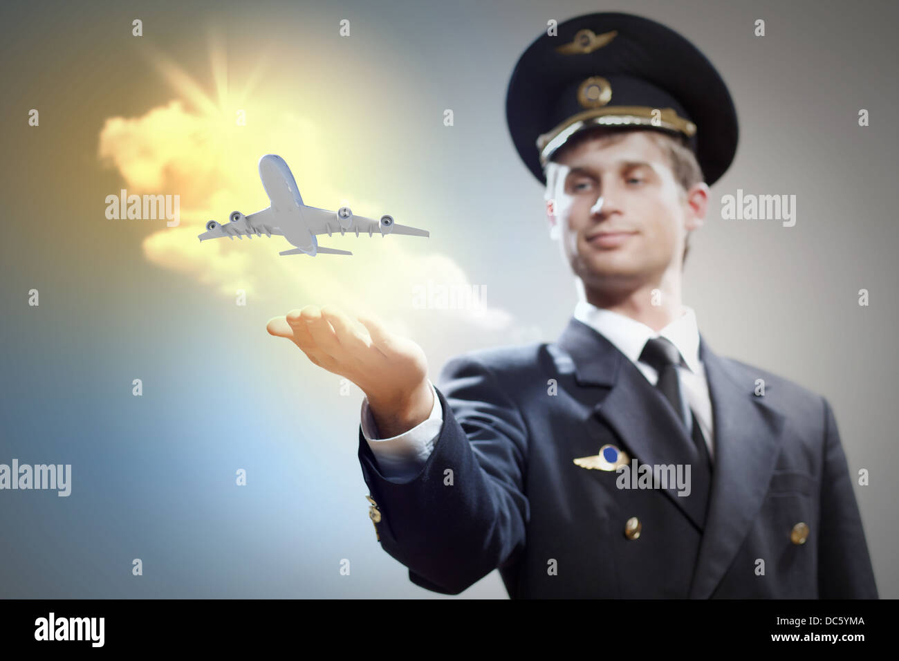 Image of pilot with plane in hand Stock Photo - Alamy