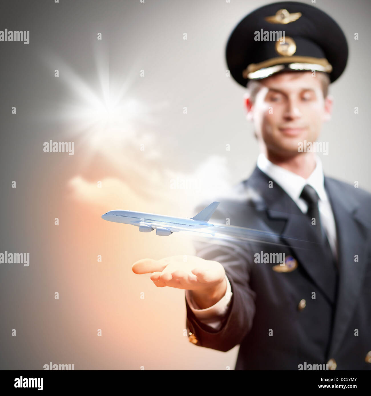 Image of pilot with plane in hand Stock Photo - Alamy