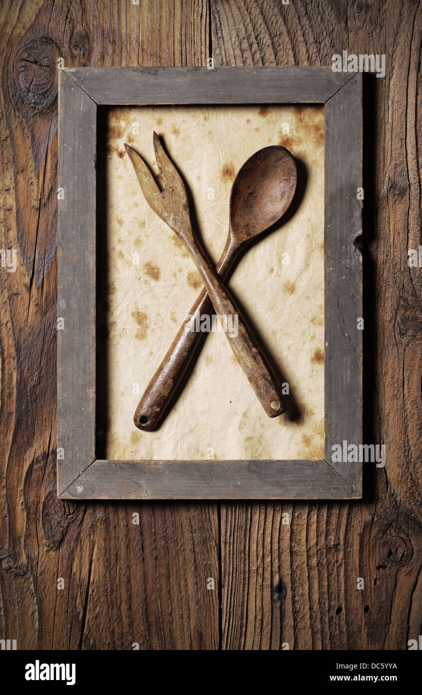 Fork and spoon wooden, framed Stock Photo - Alamy