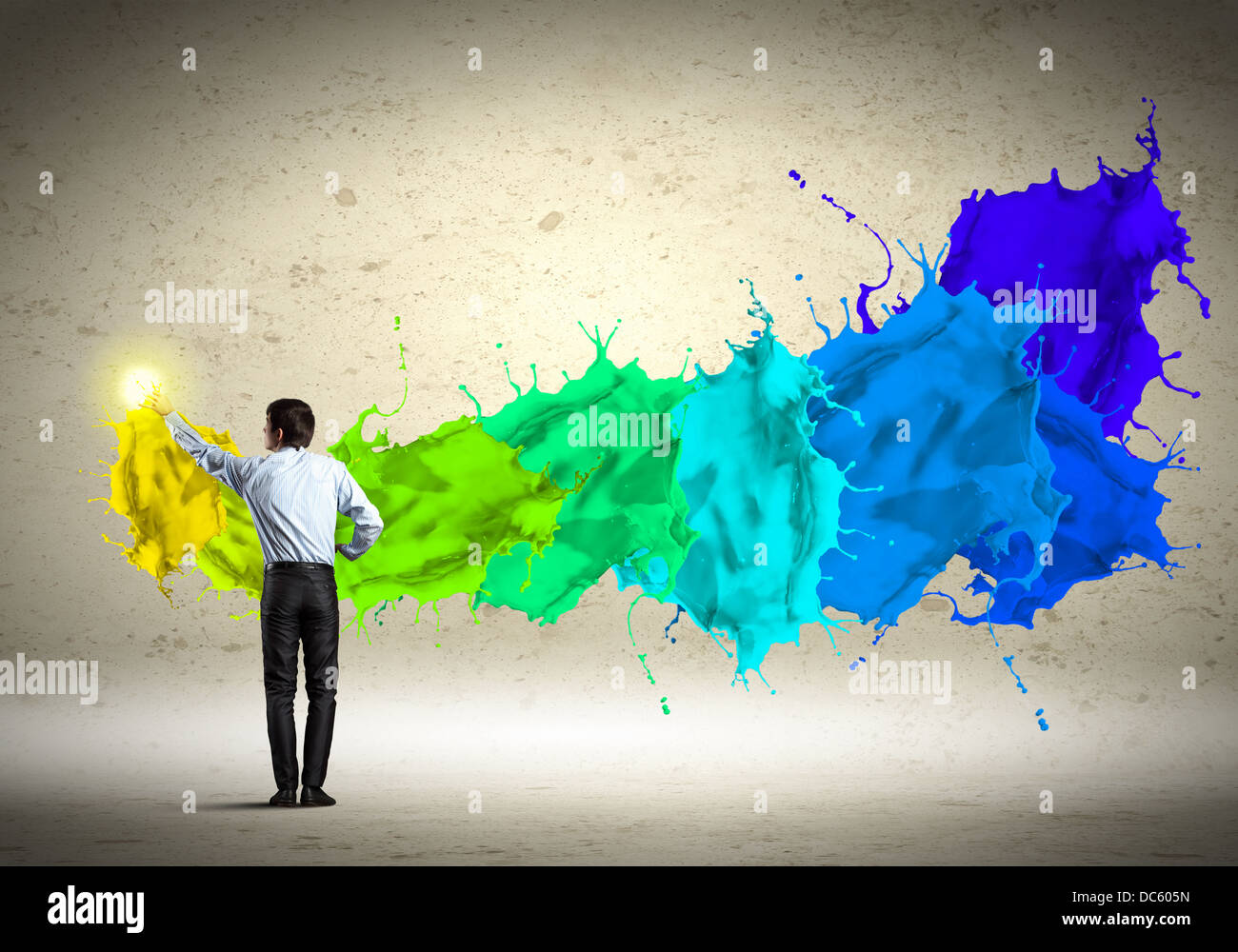 Man painting splashes Stock Photo - Alamy