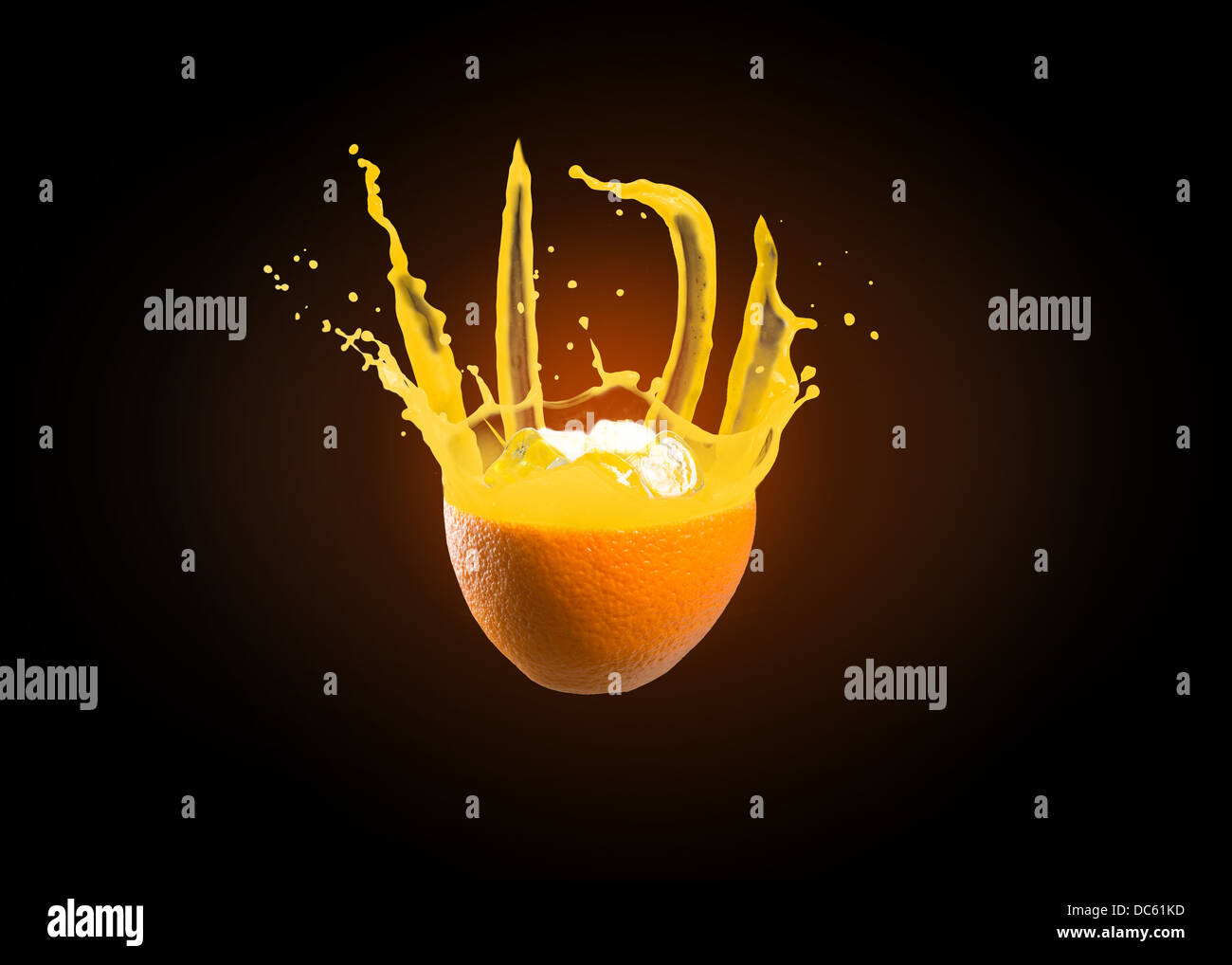 fresh orange juice with a splash Stock Photo - Alamy