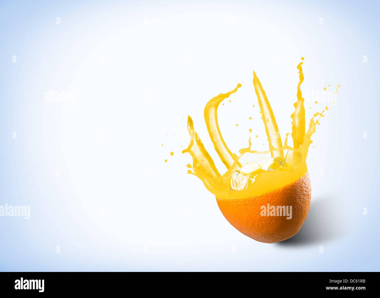 fresh orange juice with a splash Stock Photo - Alamy
