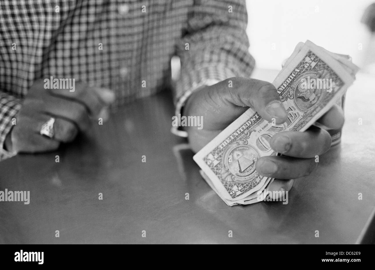 Greedy money man black Black and White Stock Photos & Images - Alamy