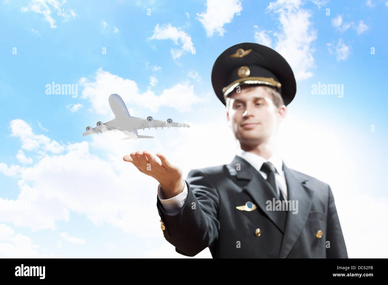 Image of pilot with plane in hand Stock Photo - Alamy