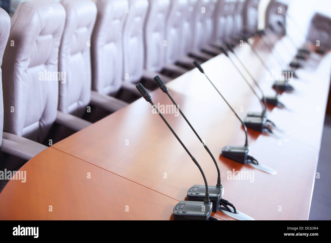Conference hall with microphones Stock Photo - Alamy