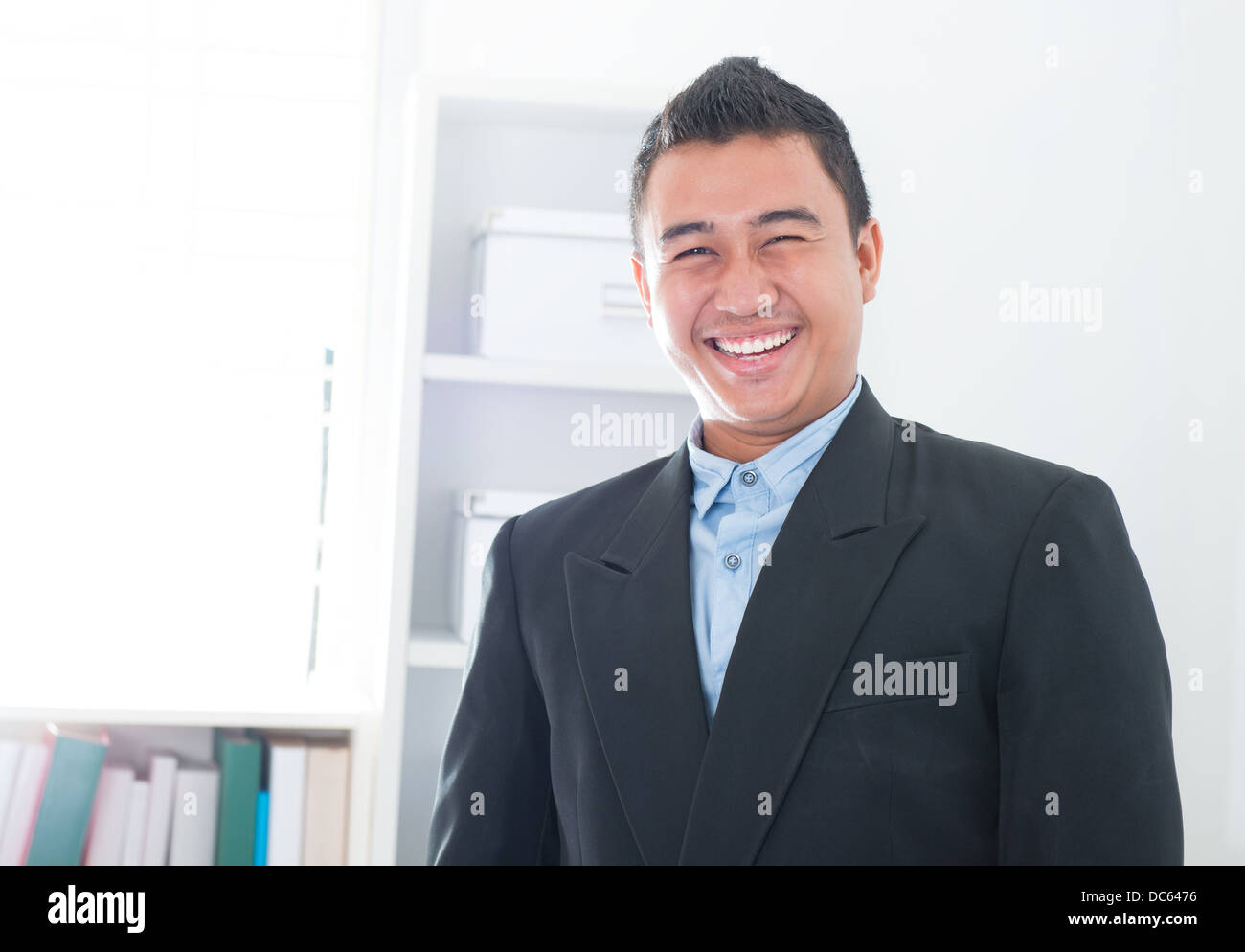 Attractive Southeast Asian executive Stock Photo - Alamy