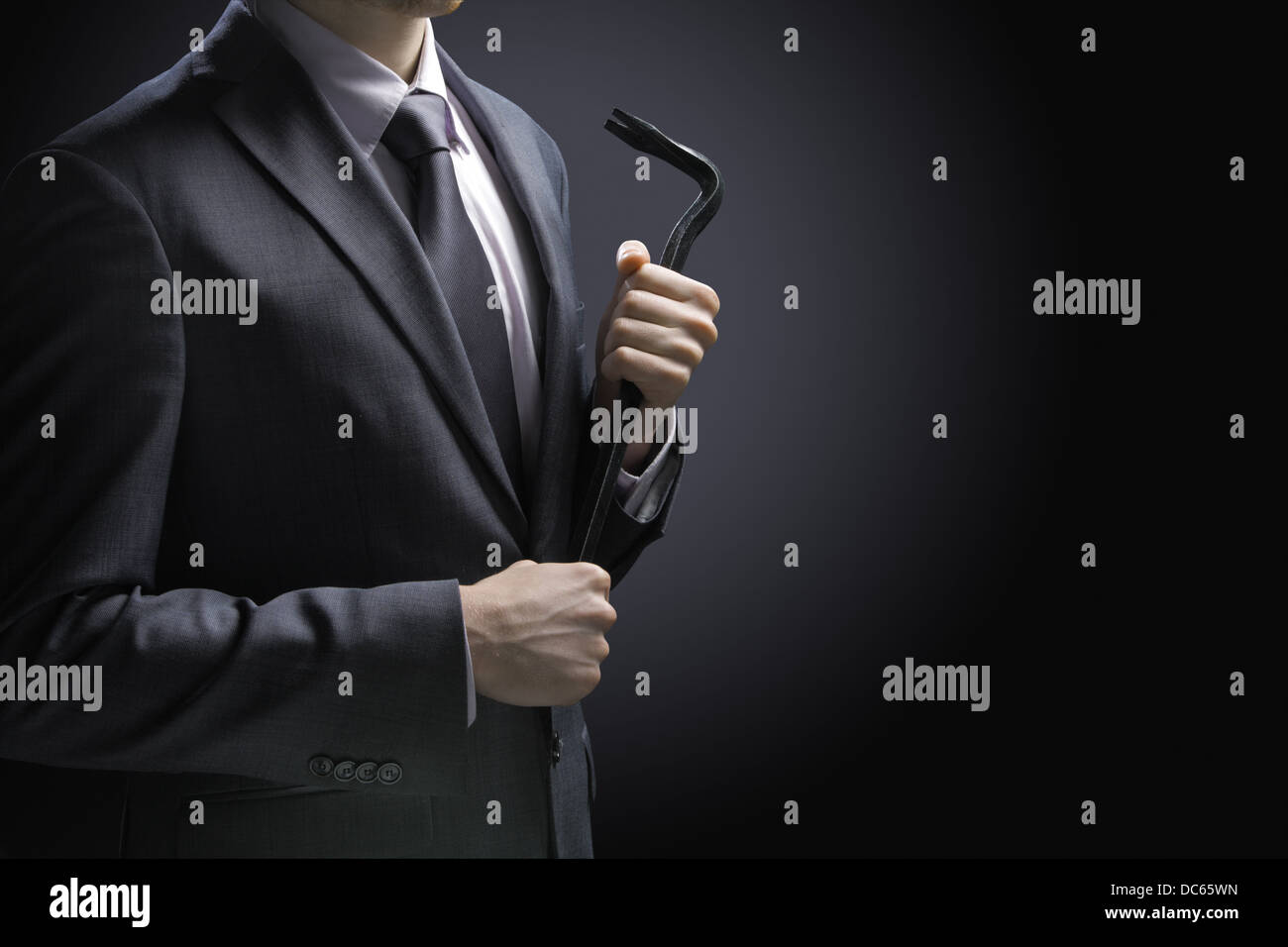Thief in black suit hi-res stock photography and images - Alamy