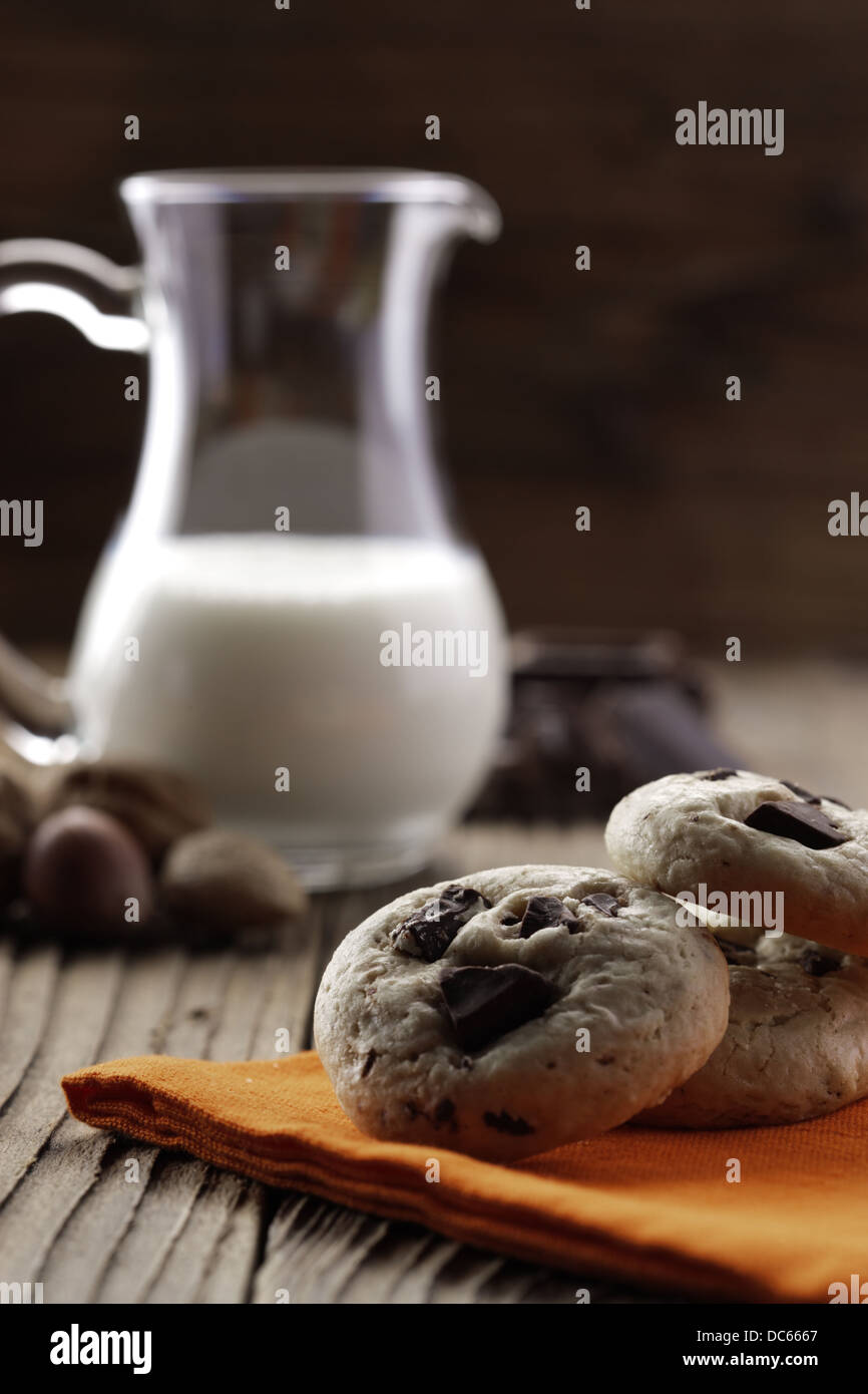 Chocolate chip cookies with ingredients in the background Stock Photo ...