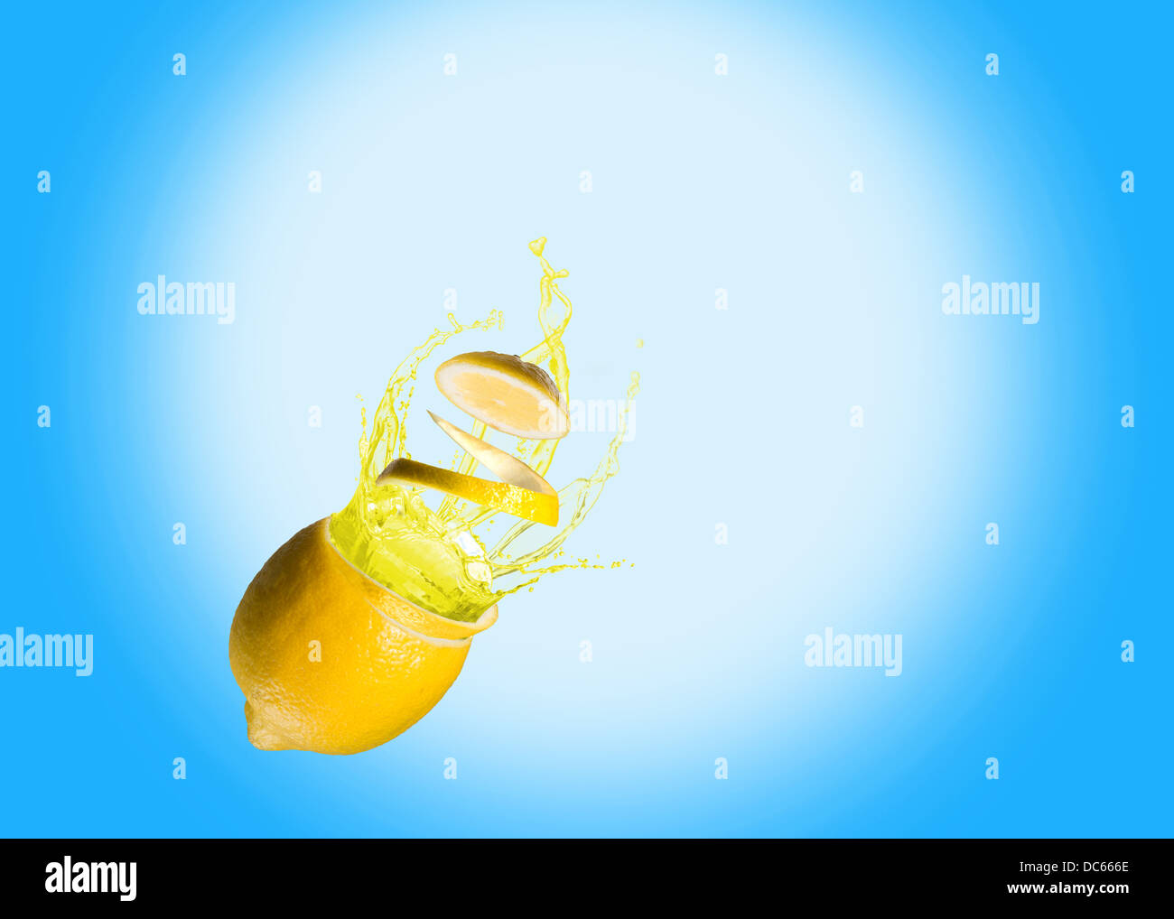 lemon and a splash of juice Stock Photo - Alamy