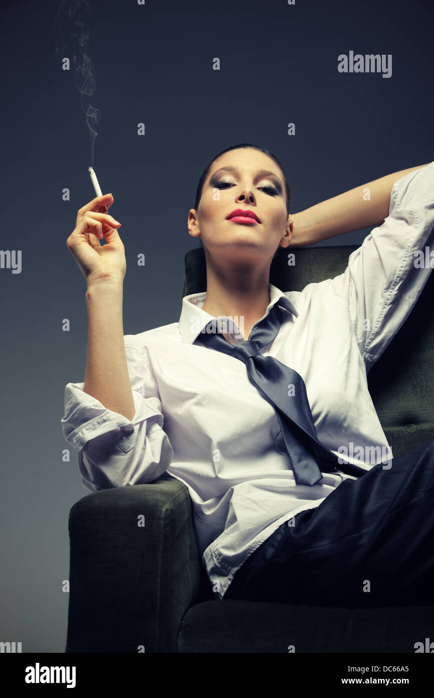 Sensual Woman Smoking A Cigarette Stock Photo Alamy