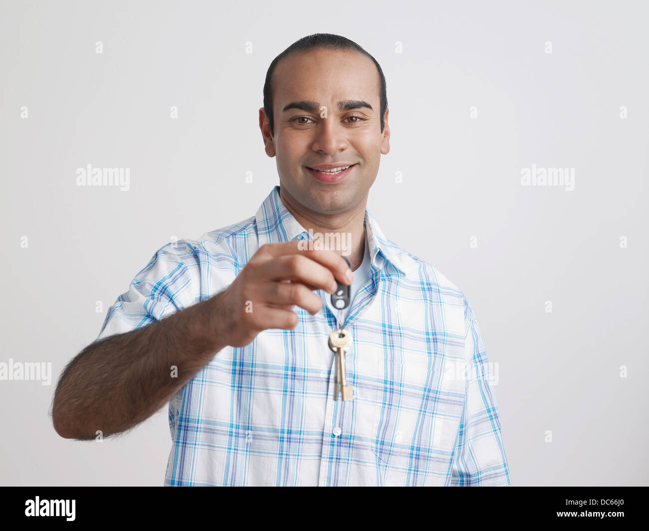 man holding keys to new home Stock Photo - Alamy