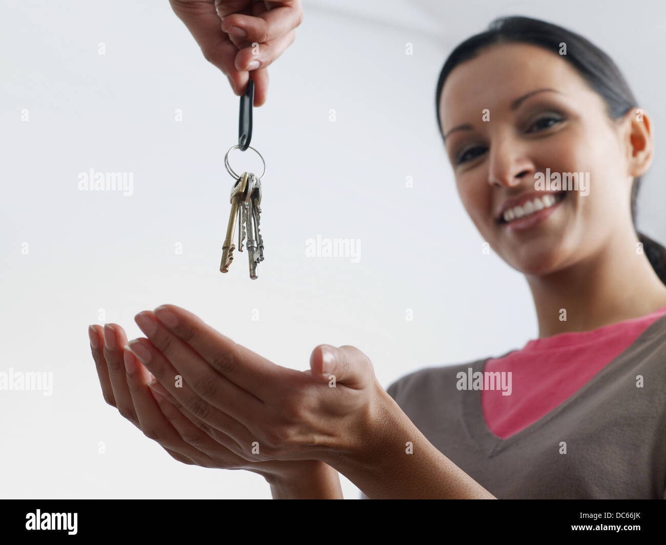 Couple receiving house keys hi-res stock photography and images - Alamy