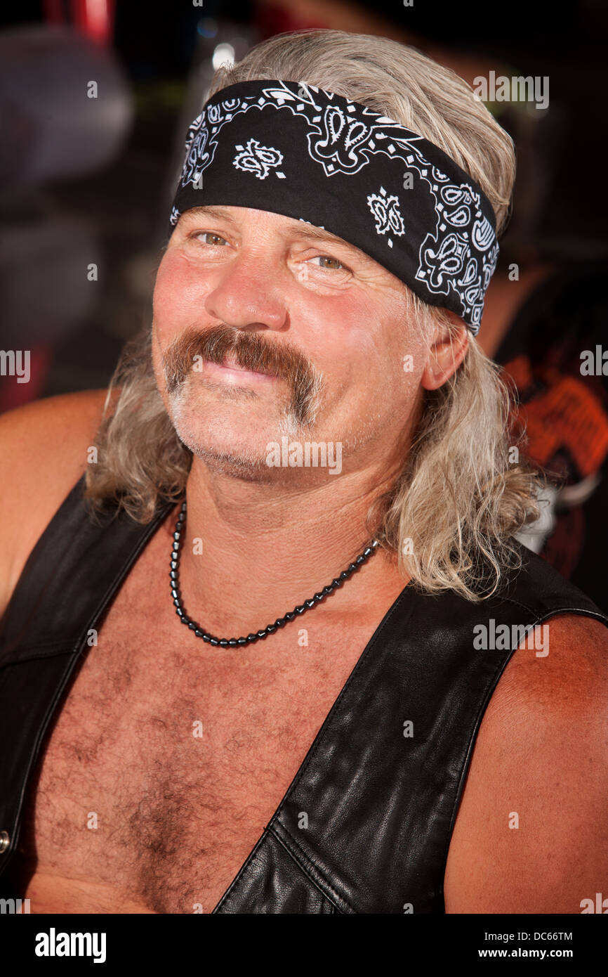 Grinning Tough Guy Stock Photo - Alamy