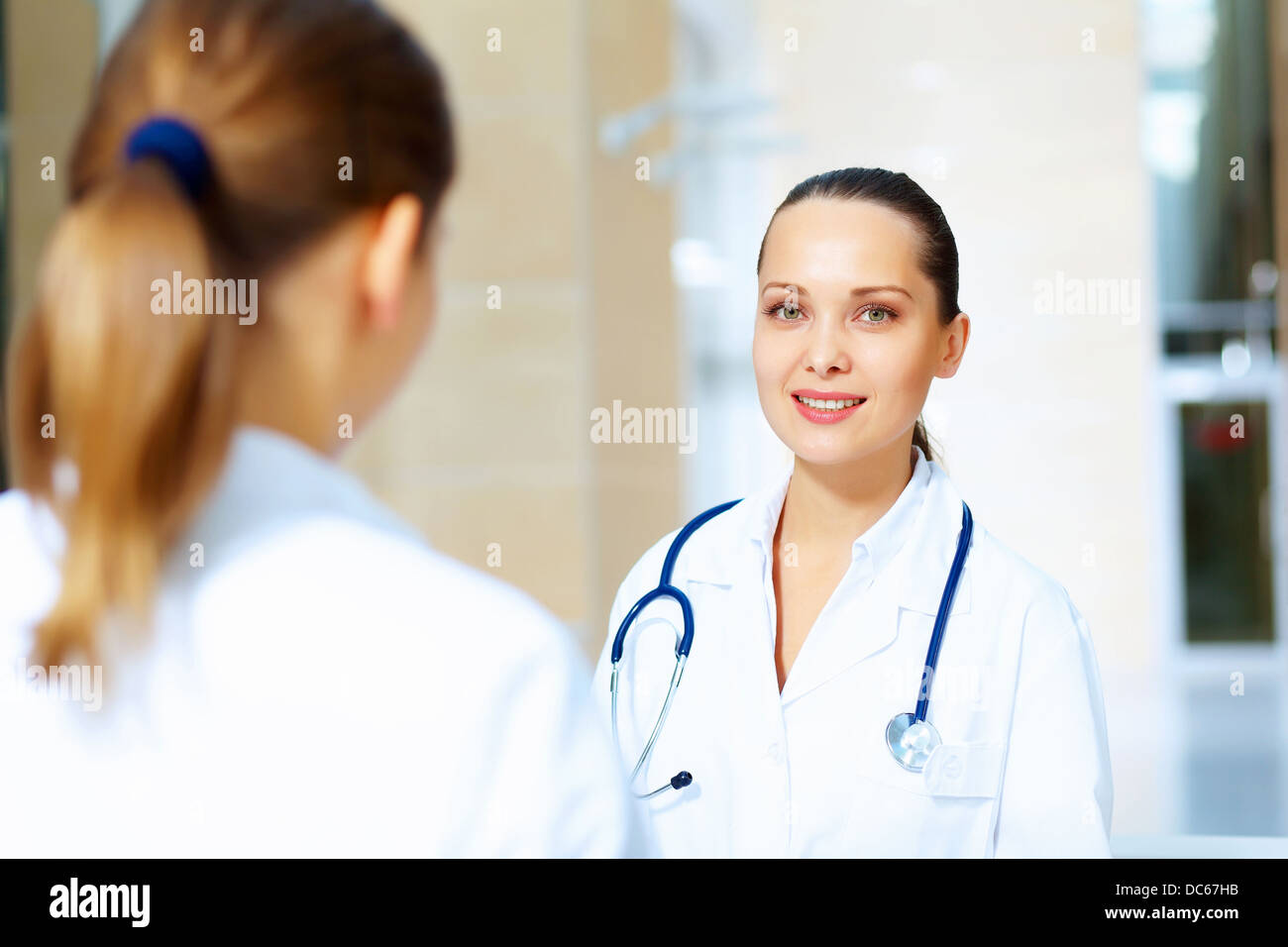 Portrait of two friendly female doctors Stock Photo - Alamy