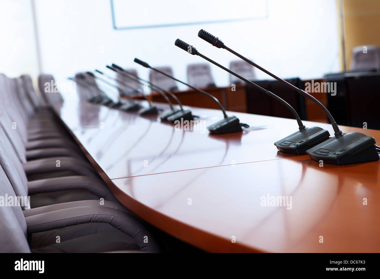 Conference hall with microphones Stock Photo - Alamy