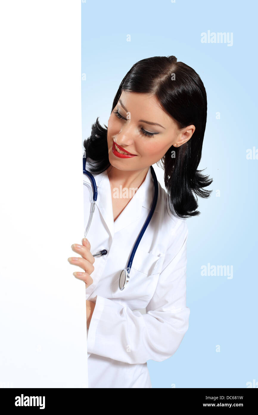 Young female doctor with a banner Stock Photo - Alamy