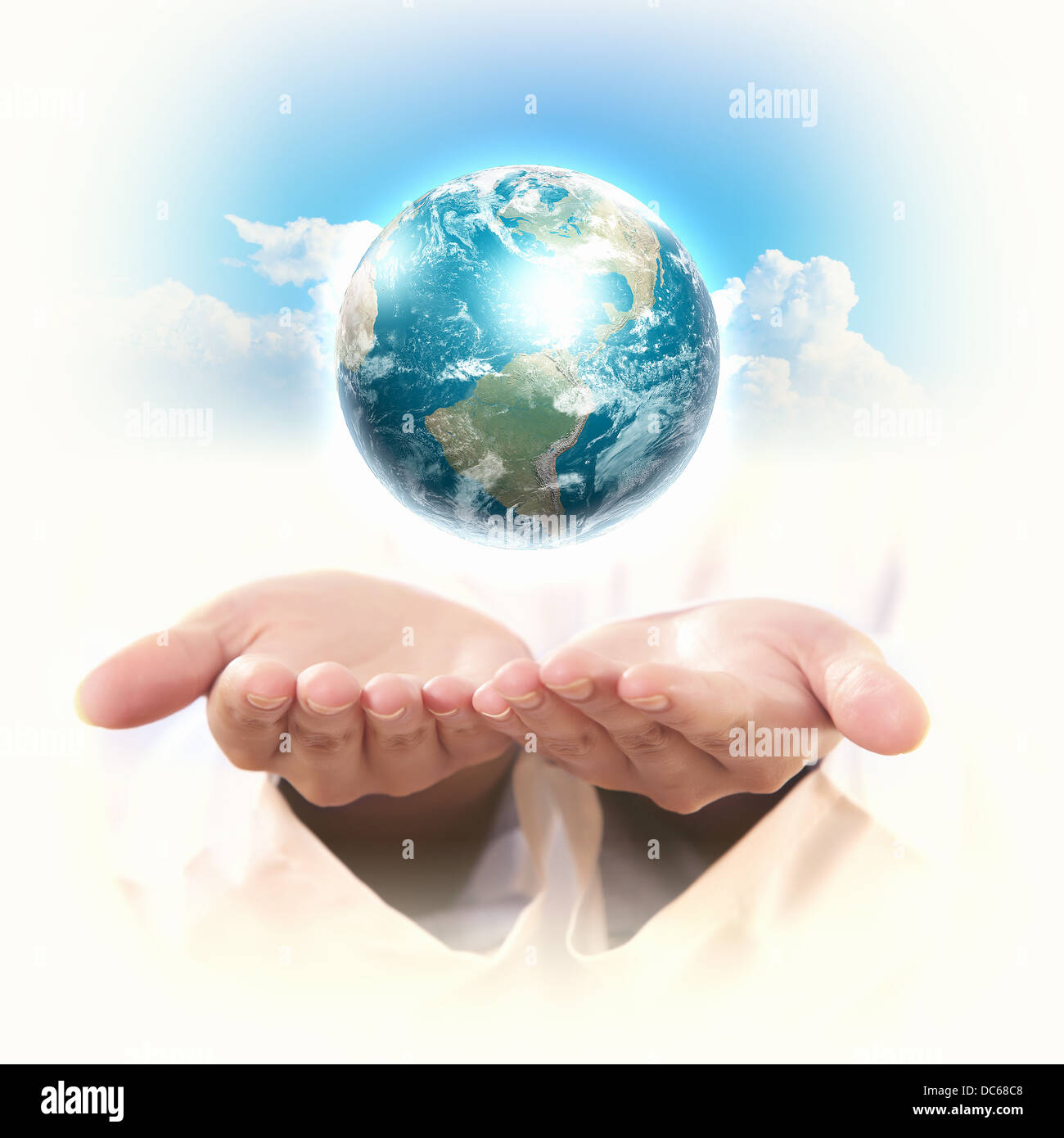 planet system in your hands Stock Photo - Alamy