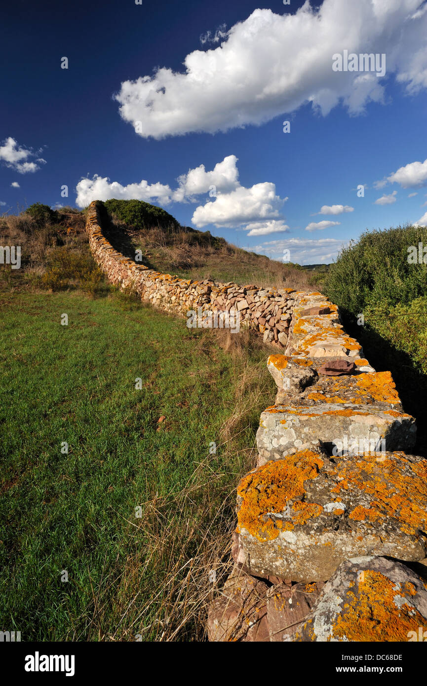 Landscape with an ancient stone wall Stock Photo - Alamy