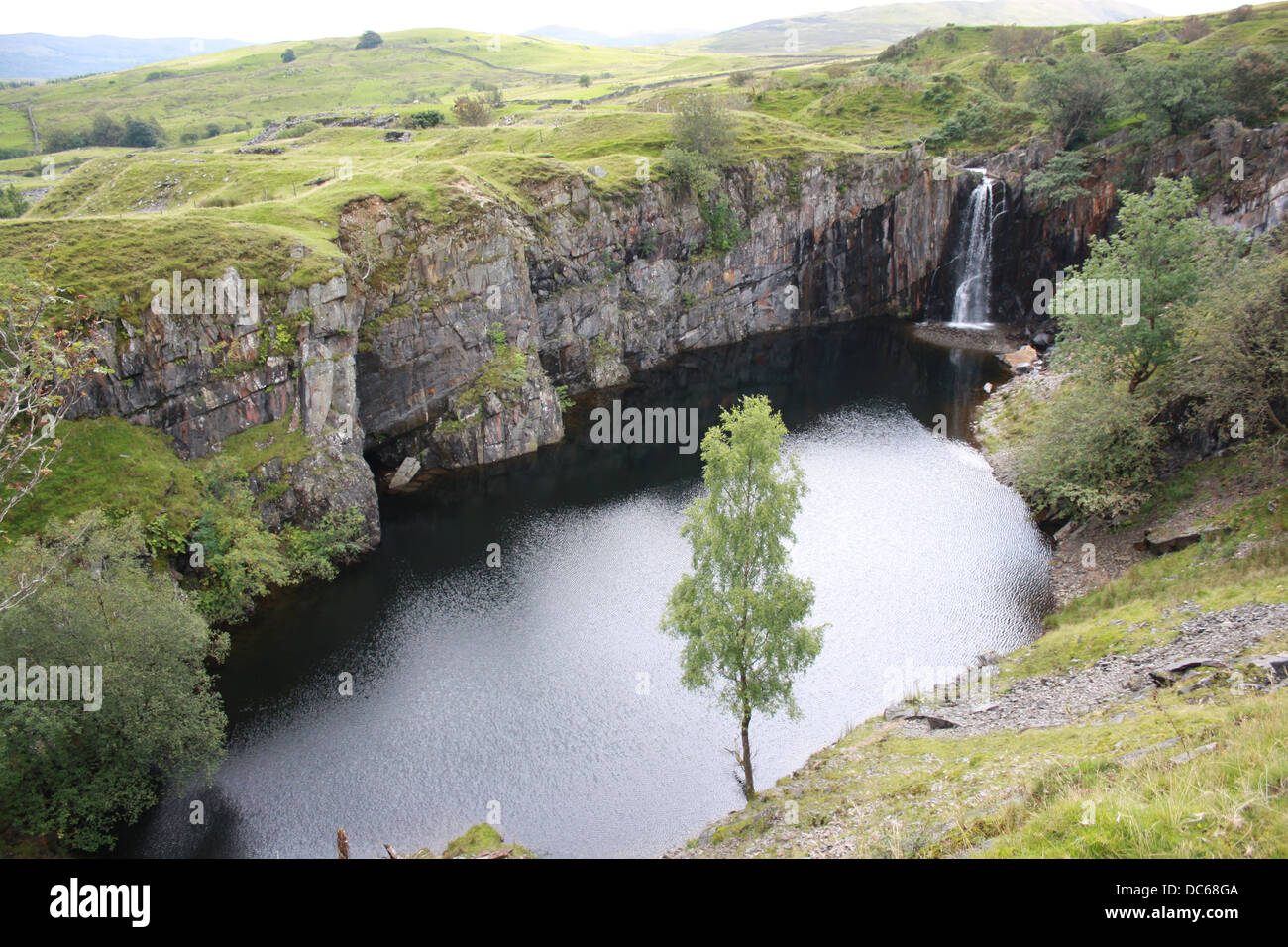lake and waterfall by Coniston old man Stock Photo - Alamy