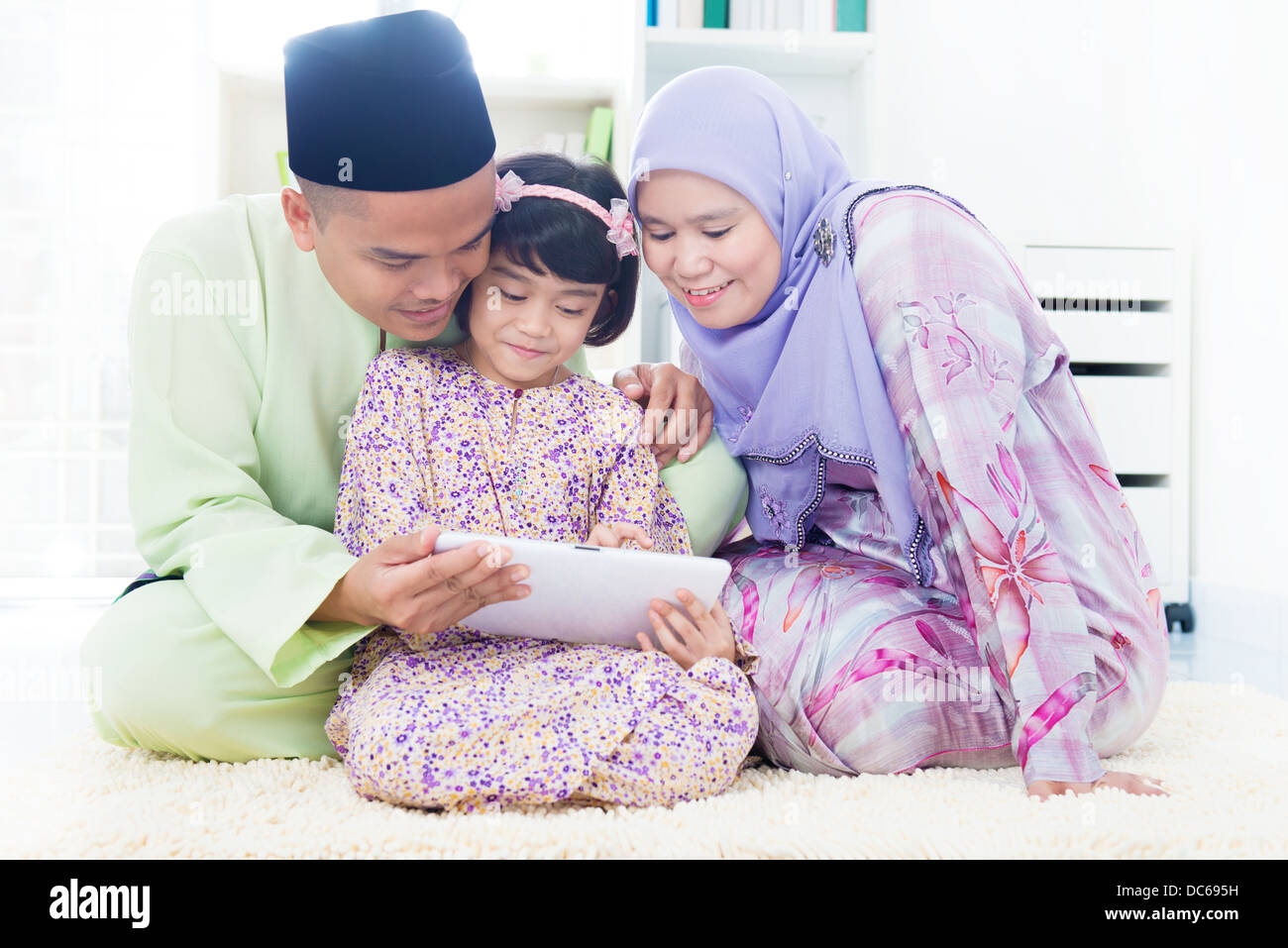 Using computer internet at home Stock Photo - Alamy