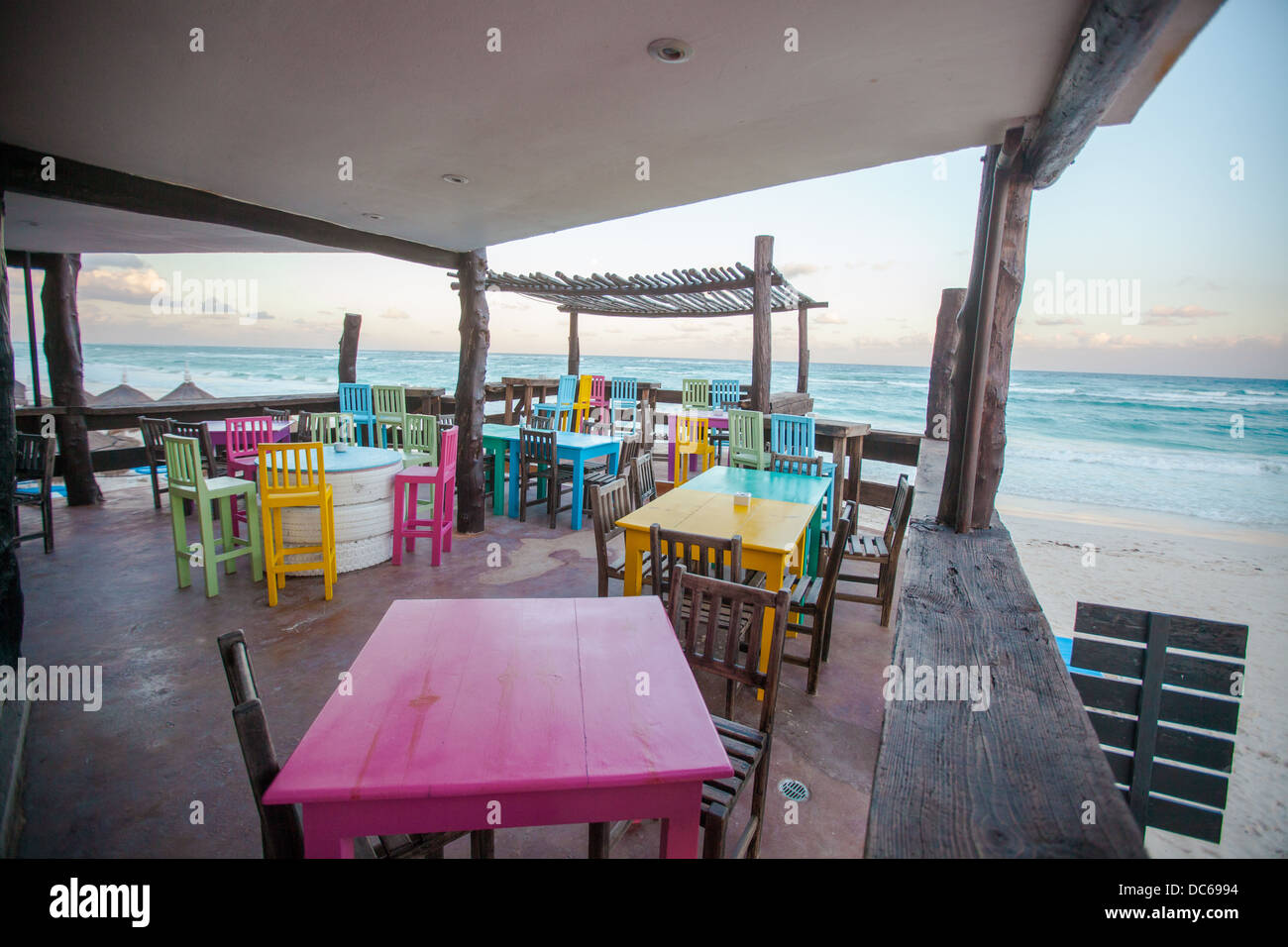 Bright colored bar-restaurant on the white sandy beach in Tulum Stock ...