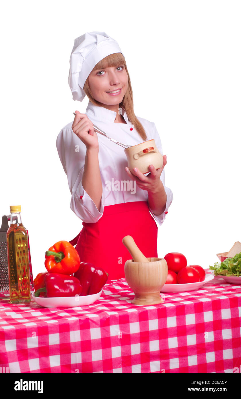 Attractive cook woman a over white background Stock Photo - Alamy