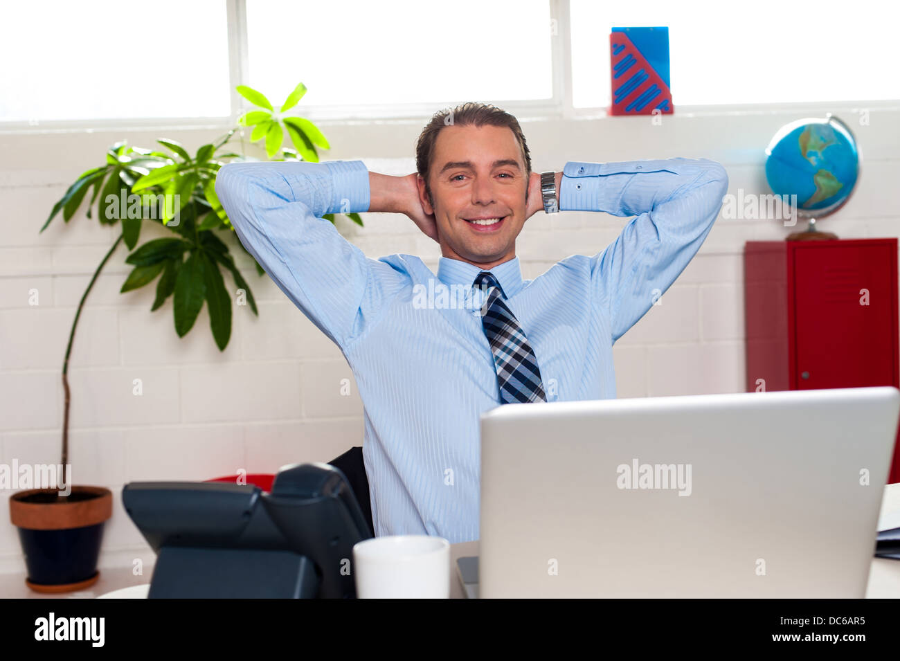 Businessman relaxing work hi-res stock photography and images - Alamy