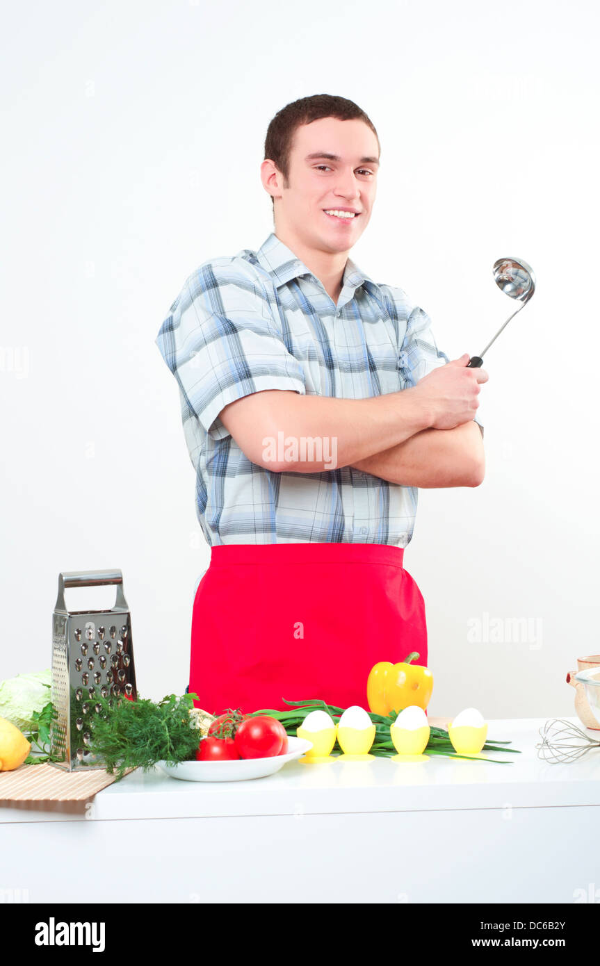 portrait of a young man, hold ladle Stock Photo - Alamy