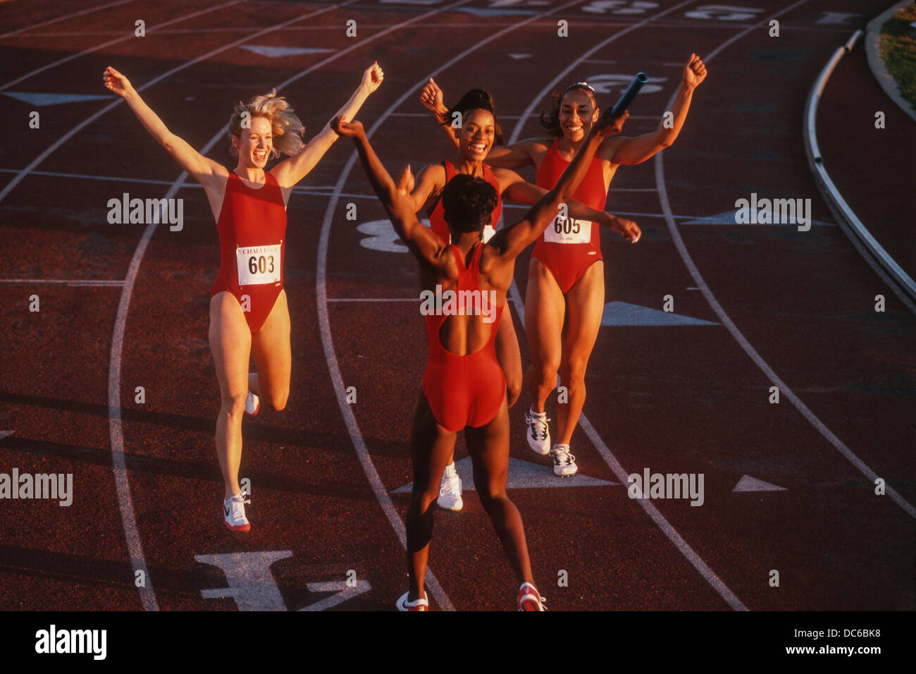 Women's track and field relay team celebrating their victory Stock ...
