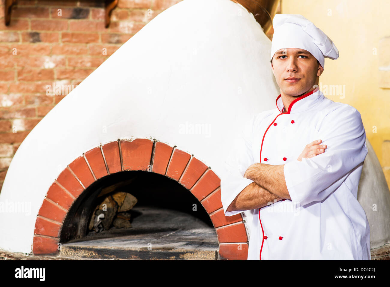 portrait of a cook in the kitchen Stock Photo - Alamy