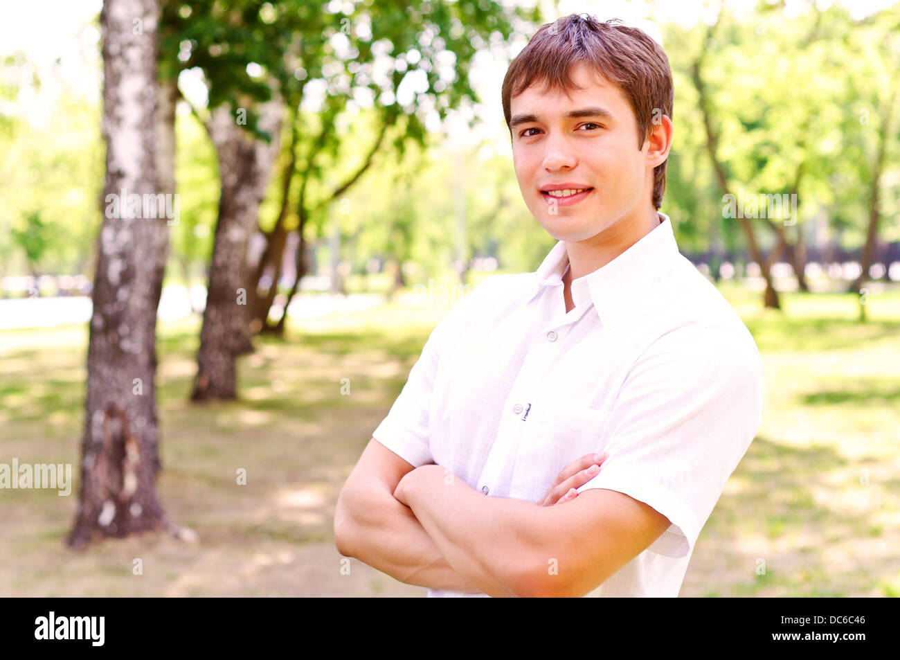 Portrait of man outside in park Stock Photo - Alamy