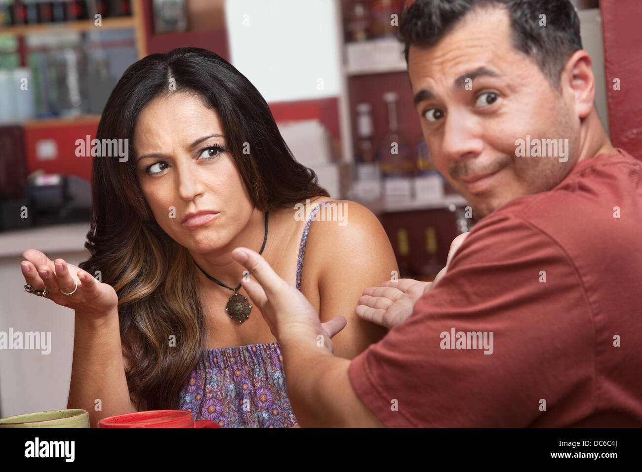 Bickering Couple in Cafe Stock Photo - Alamy