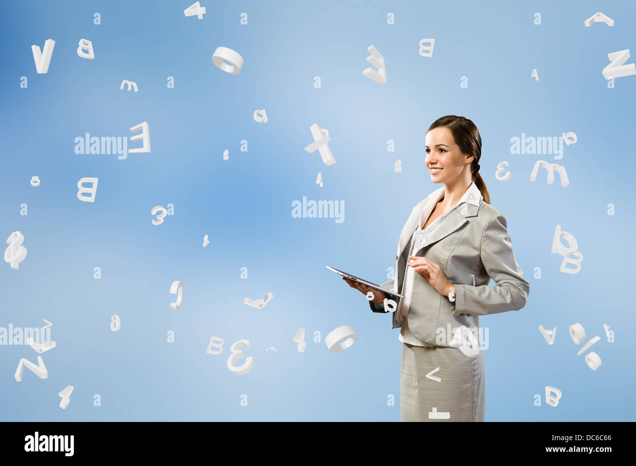 Attractive business woman is working with tablet Stock Photo - Alamy