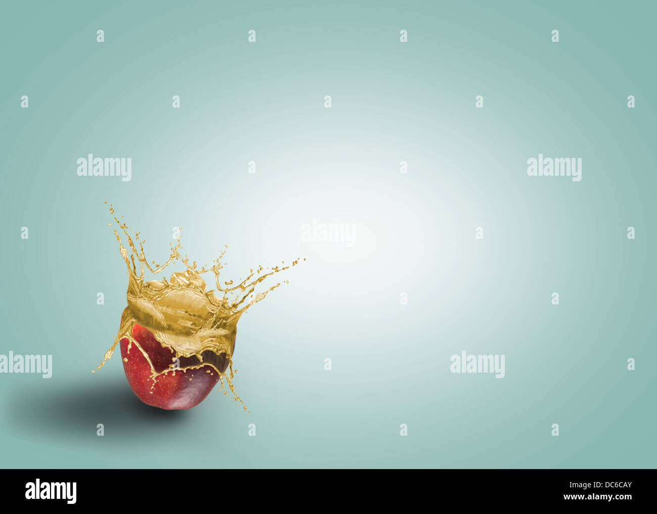 fresh juice pouring out of the apple Stock Photo - Alamy