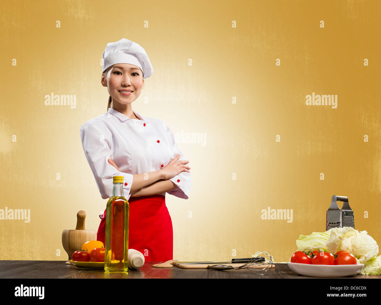 Asian cook woman crossed her arms Stock Photo - Alamy